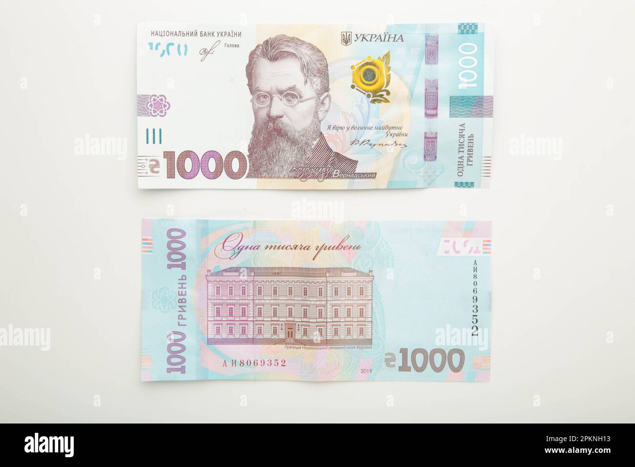 1000 new banknote of Ukraine on white background. Save and money ...