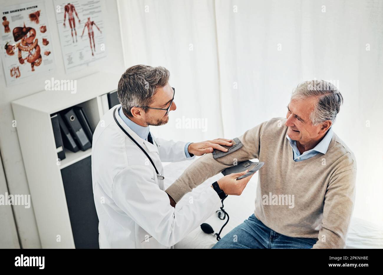 Early detection is the best cure. a male doctor talking to a senior ...
