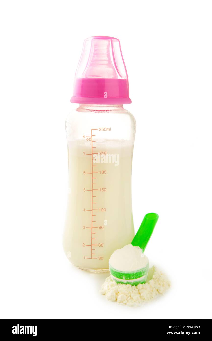 Baby milk bottle with powder isolated on white background. Top view ...