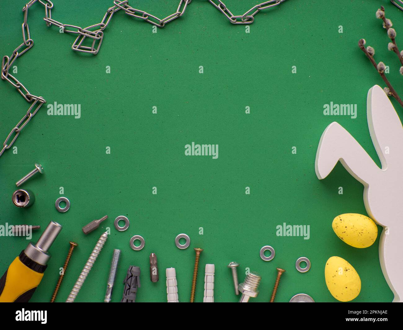 Easter background with hand tools, fasteners, fittings, eggs and white ...