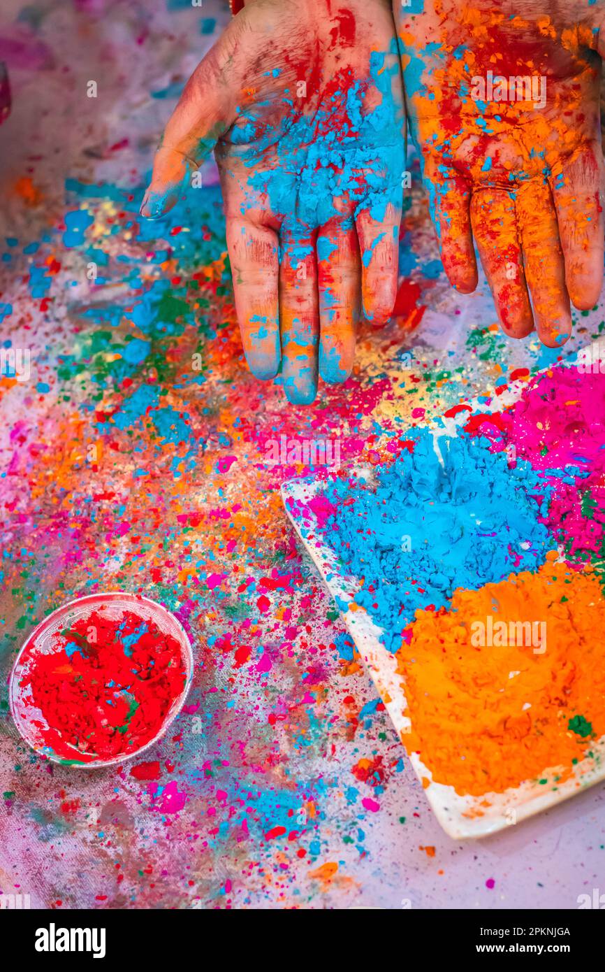 colorful hand at holi celebration with multicolor from flat angle Stock ...