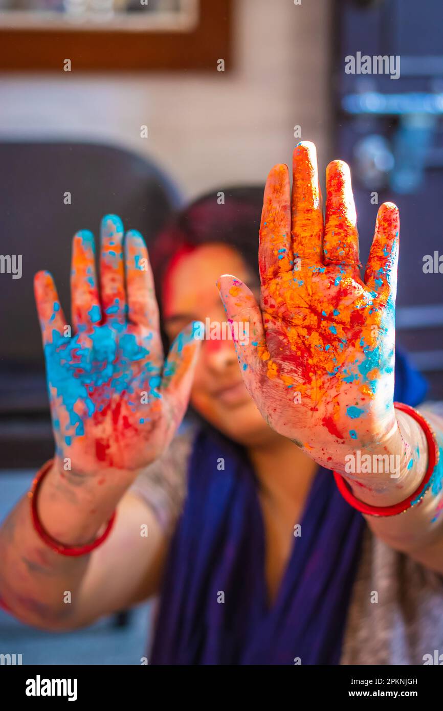 colorful hand at holi celebration with multicolor from flat angle Stock ...