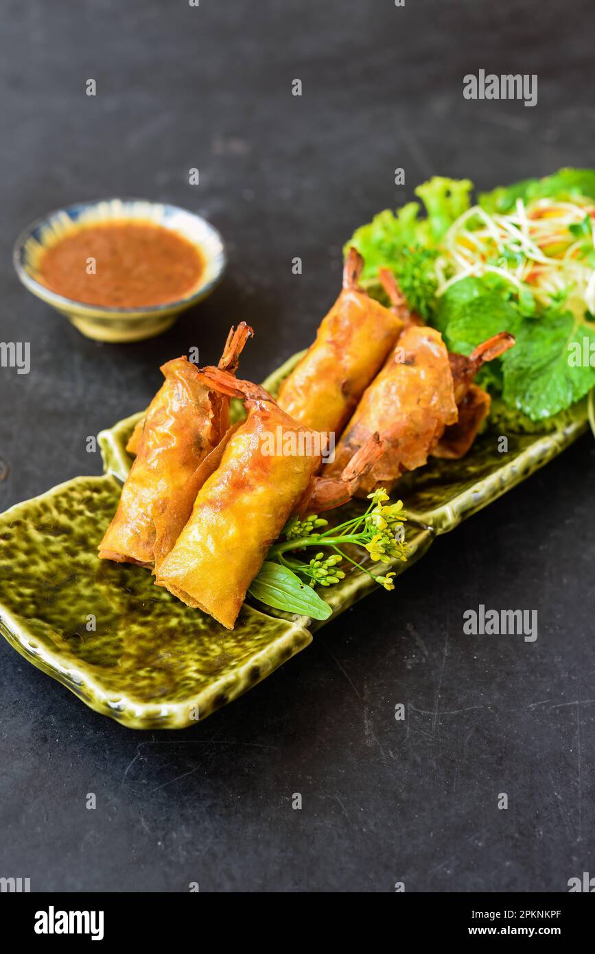 Traditional fried vietnamese spring rolls with pork, shrimp, rice paper ...