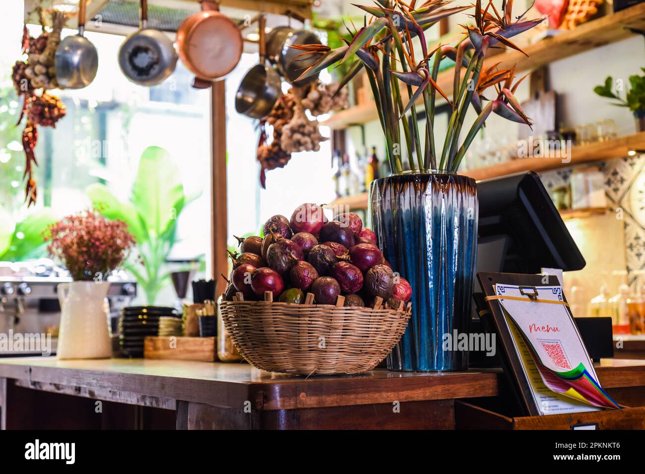 Loft design of interior with passion fruits and decor near cashier ...