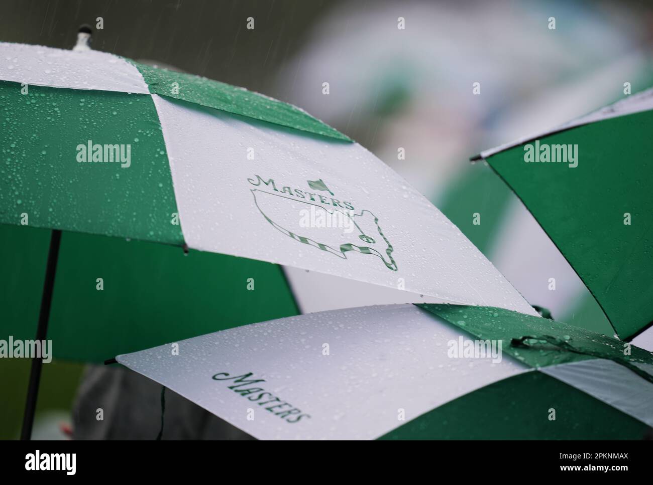 Augusta, USA. 8th Apr, 2023. Audience watch the match in the rain ...