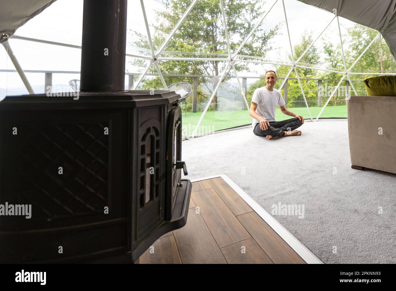 young man resting outside the city in glamping Stock Photo - Alamy