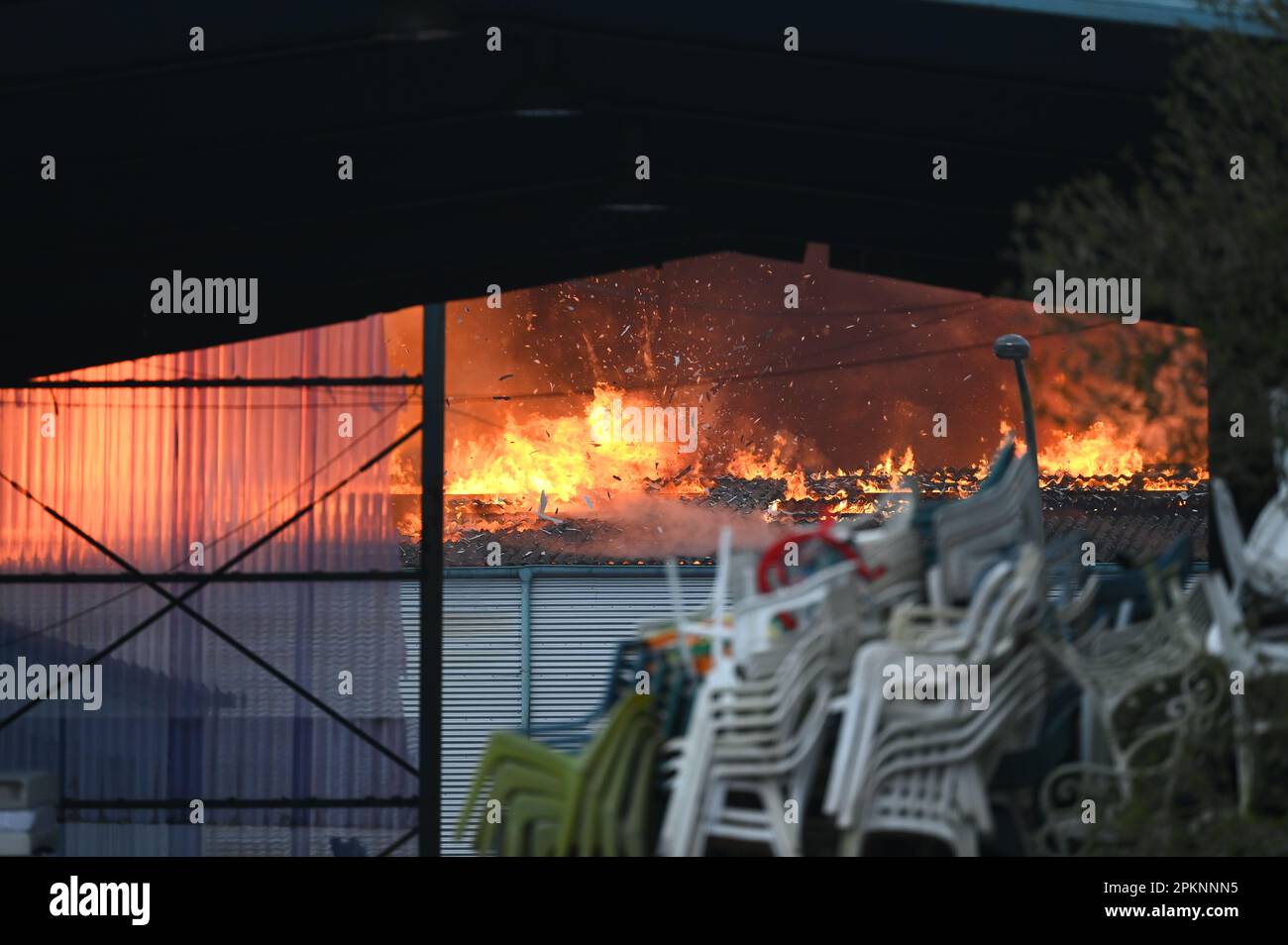 Hamburg, Germany. 09th Apr, 2023. Flames rise in a major fire in ...