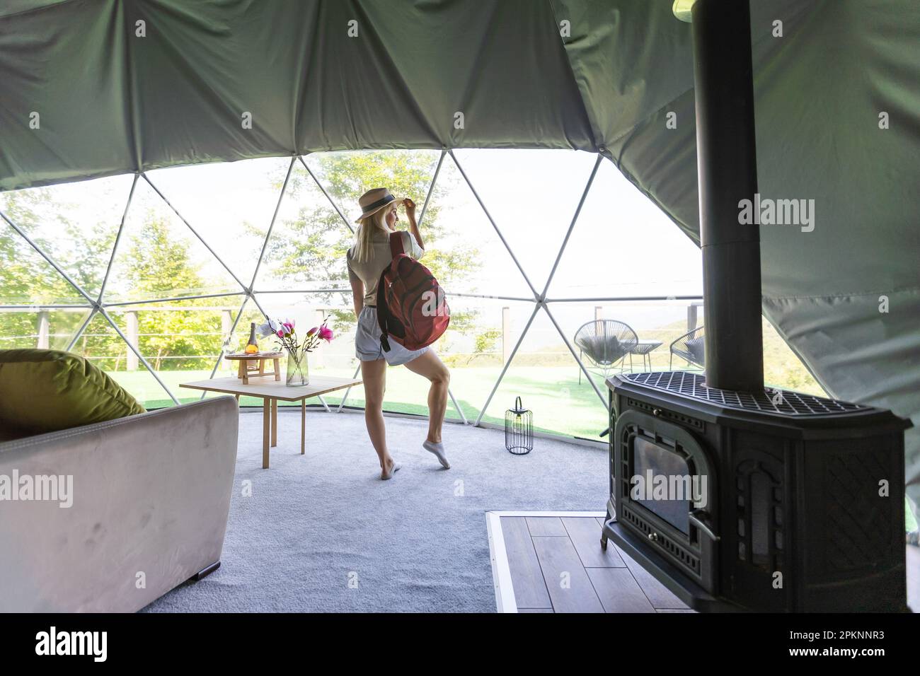 Girl sitting in glamping tent hi-res stock photography and images - Alamy