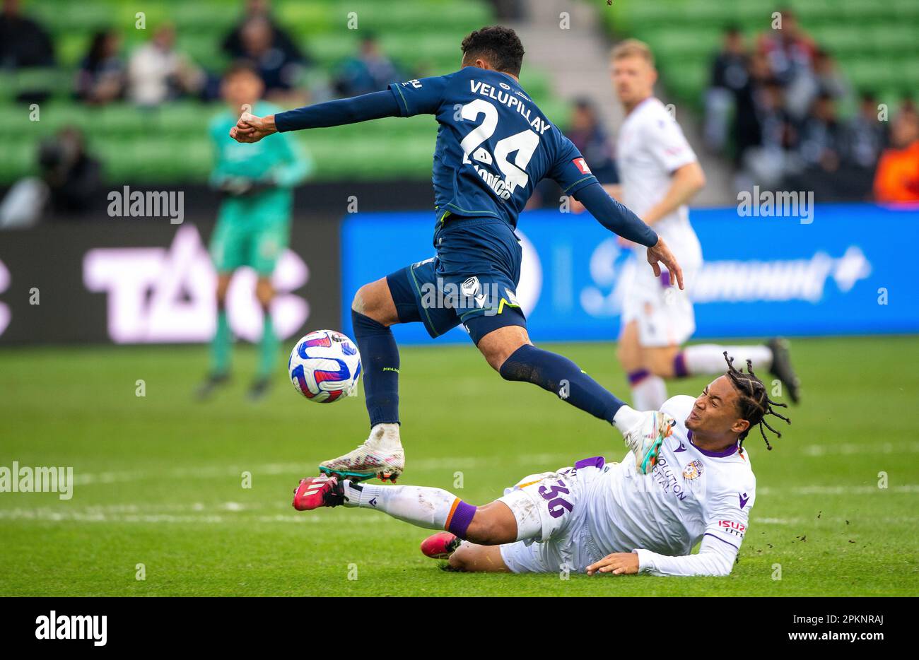 Nishan Velupillay of Melbourne Victory and Joseph Forde of Perth Glory ...
