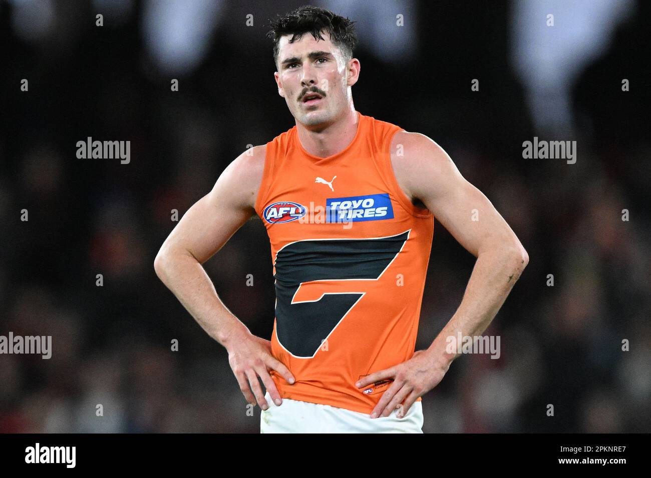 Lachie Ash of the Giants looks on after being defeated by Essendon in ...
