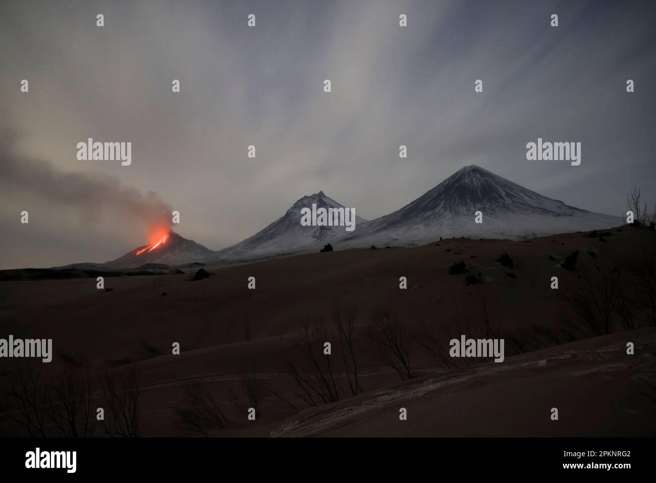 Lava and steams are visible during the the Bezymianny volcano's ...
