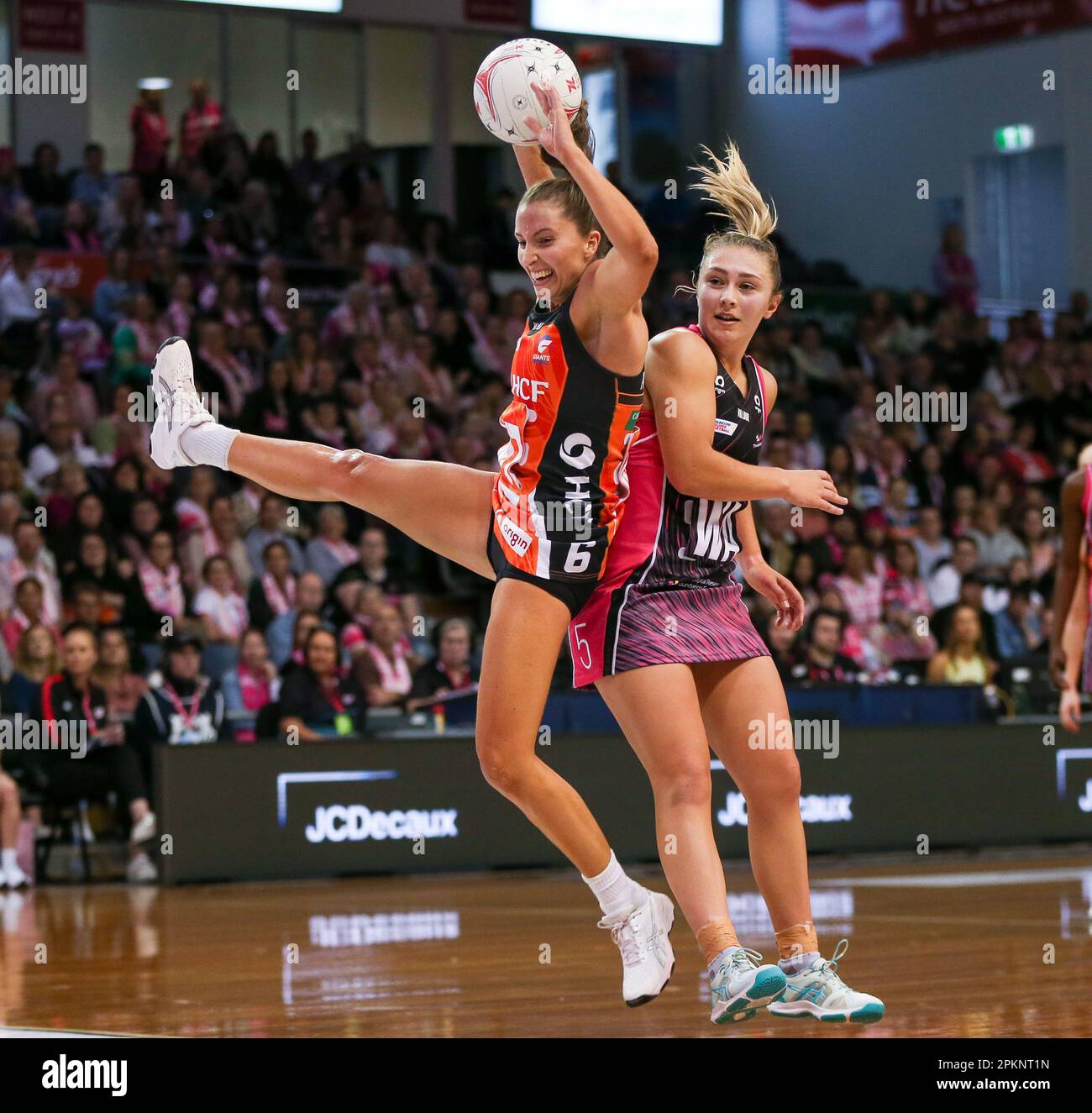Amy Parmenter of the Giants over Georgie Horjus of the Thunderbirds ...
