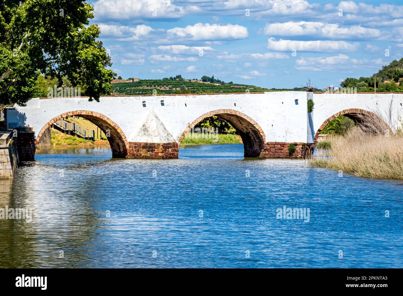 Ancient Ponte Romana de Silves, a picturesque white stone bridge over ...