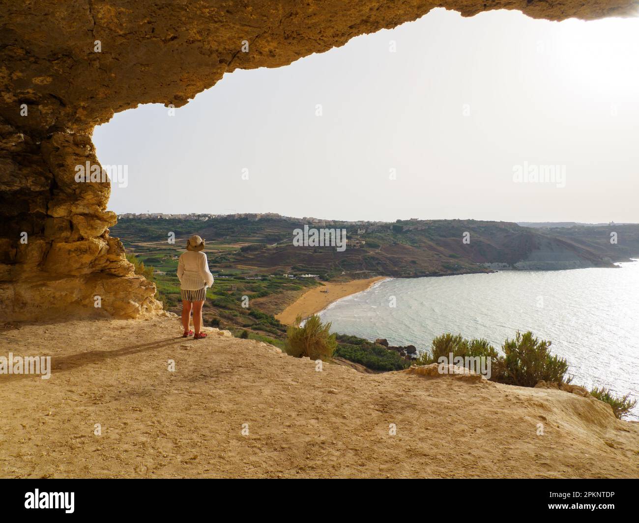 View from Tal-Mixta Cave to Ramla Bay beach on the Island of Gozo ...