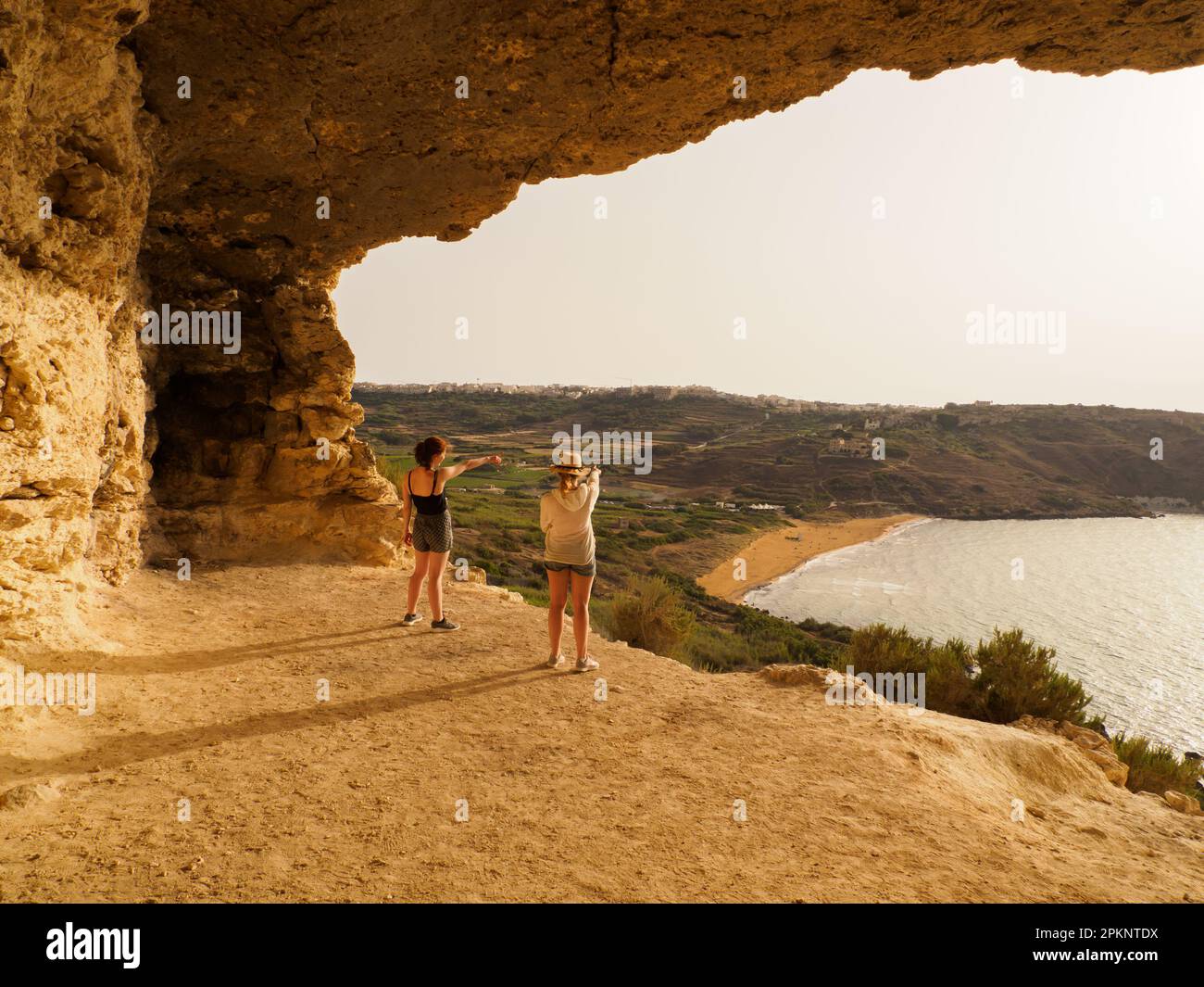 View from Tal-Mixta Cave to Ramla Bay beach on the Island of Gozo ...