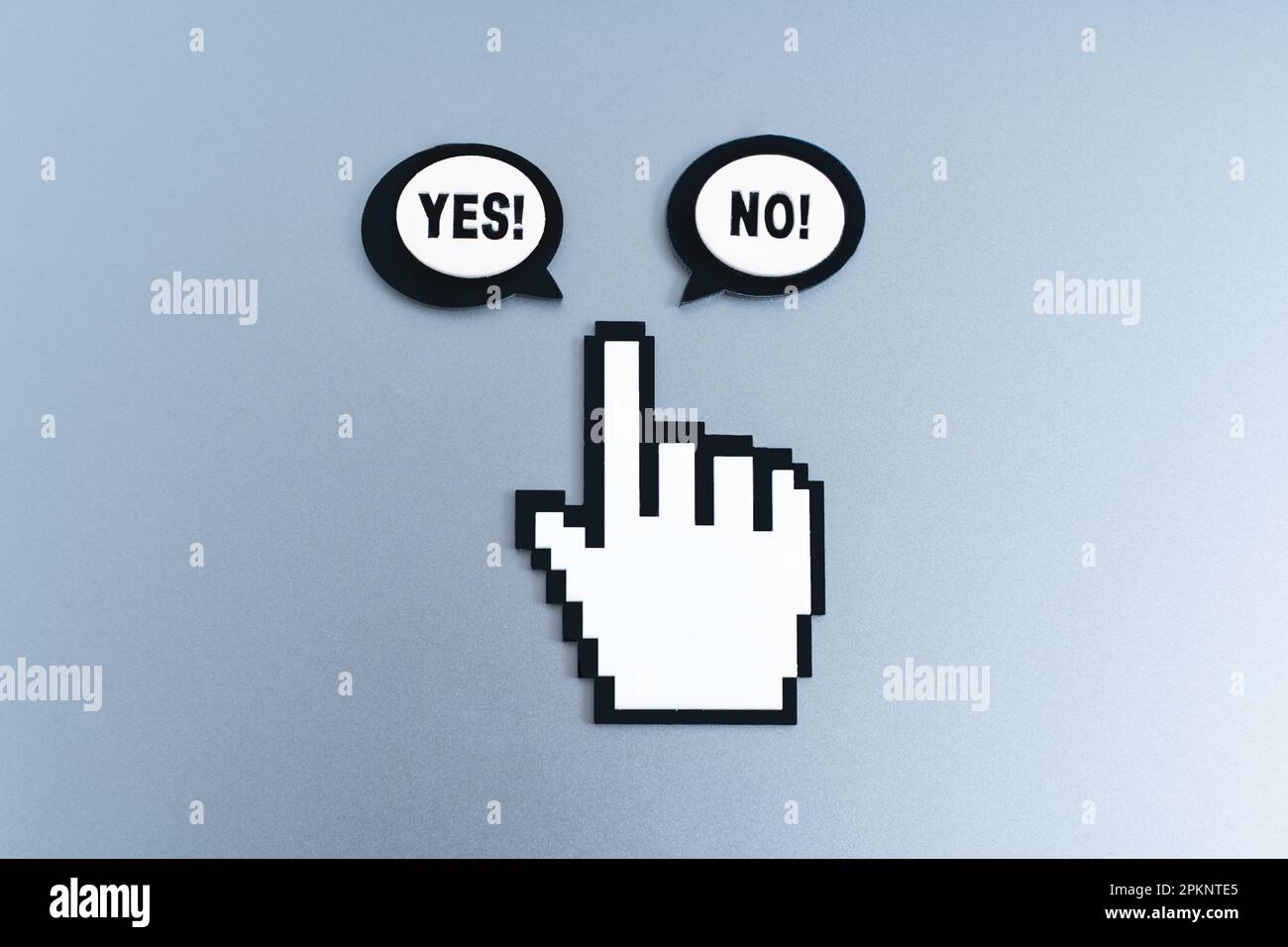 Plastic hand-shaped mouse cursor figurine and speech bubble shapes with ...