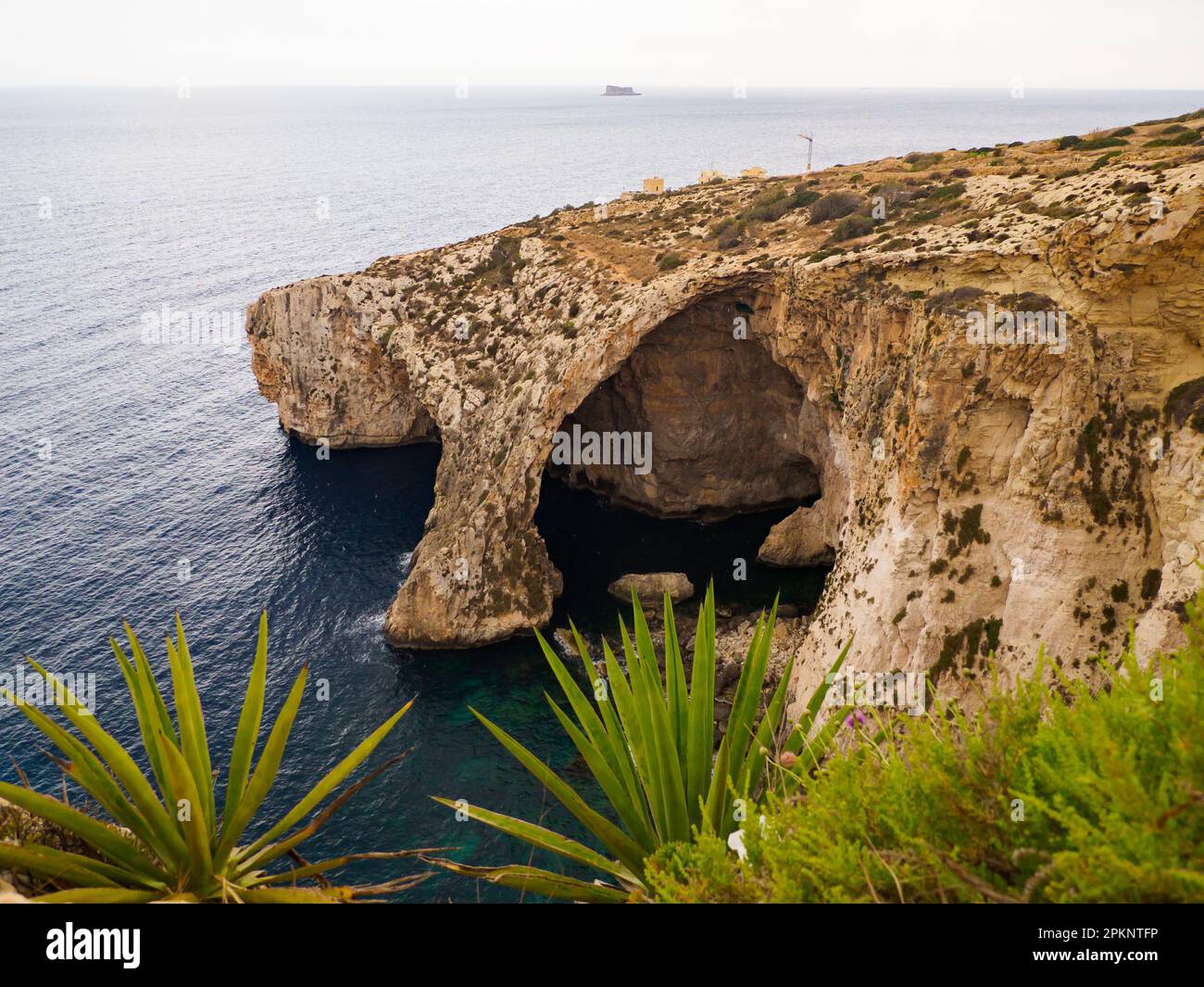 View for blue sea water and beautiful limestone arch and sea cave ...
