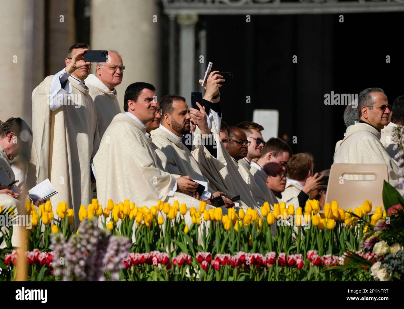 Priests take pictures in St. Peter's Square at The Vatican where Pope ...