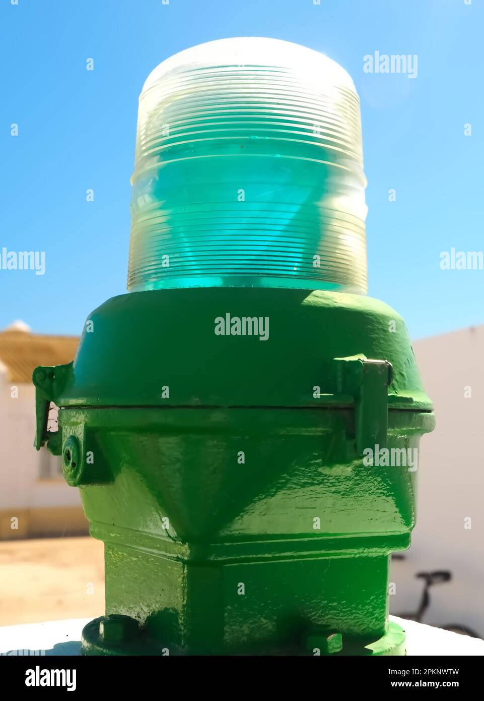 Green siren to warn or alarm people Stock Photo - Alamy