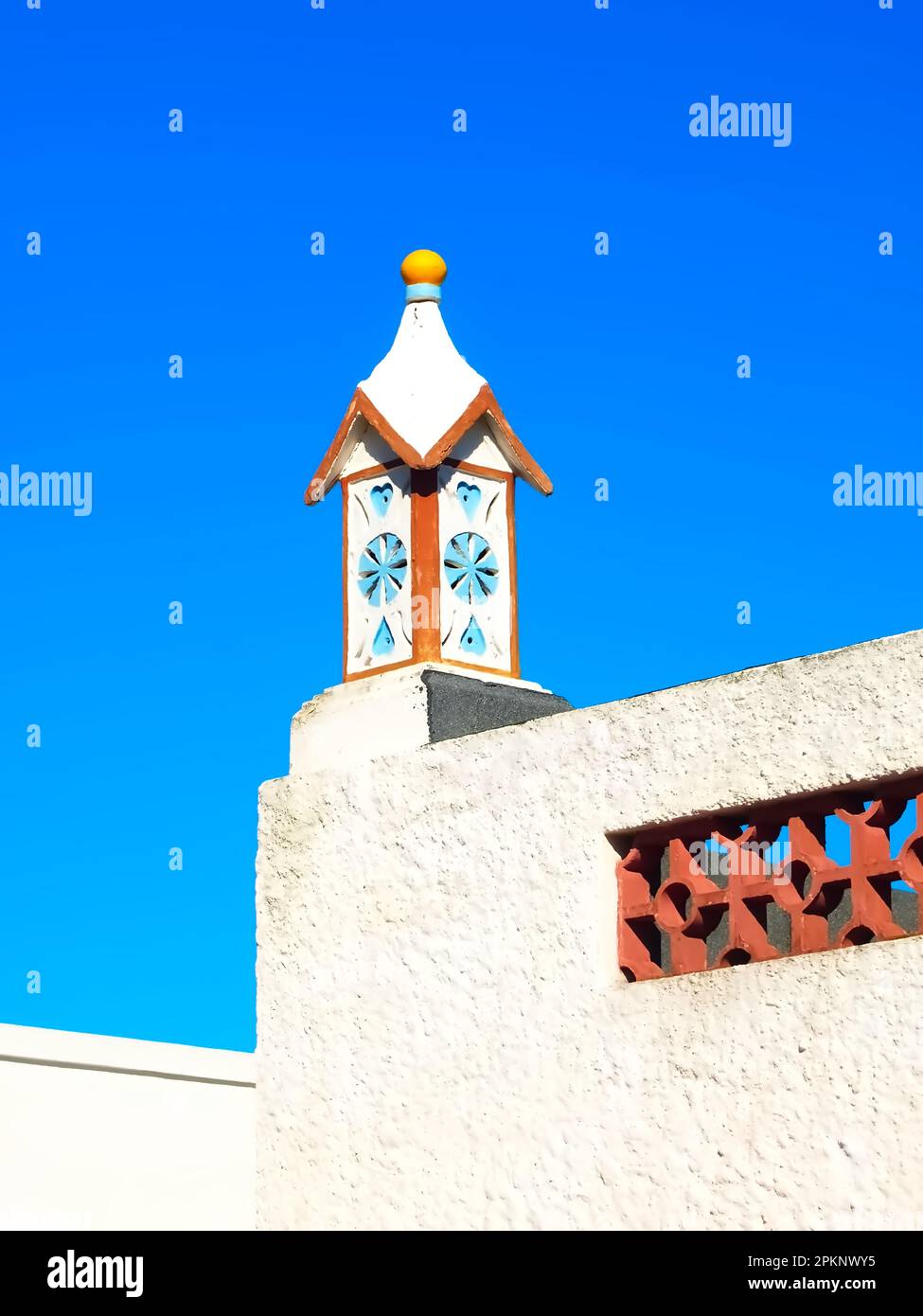 cute portuguese chimney with blue sky Stock Photo - Alamy