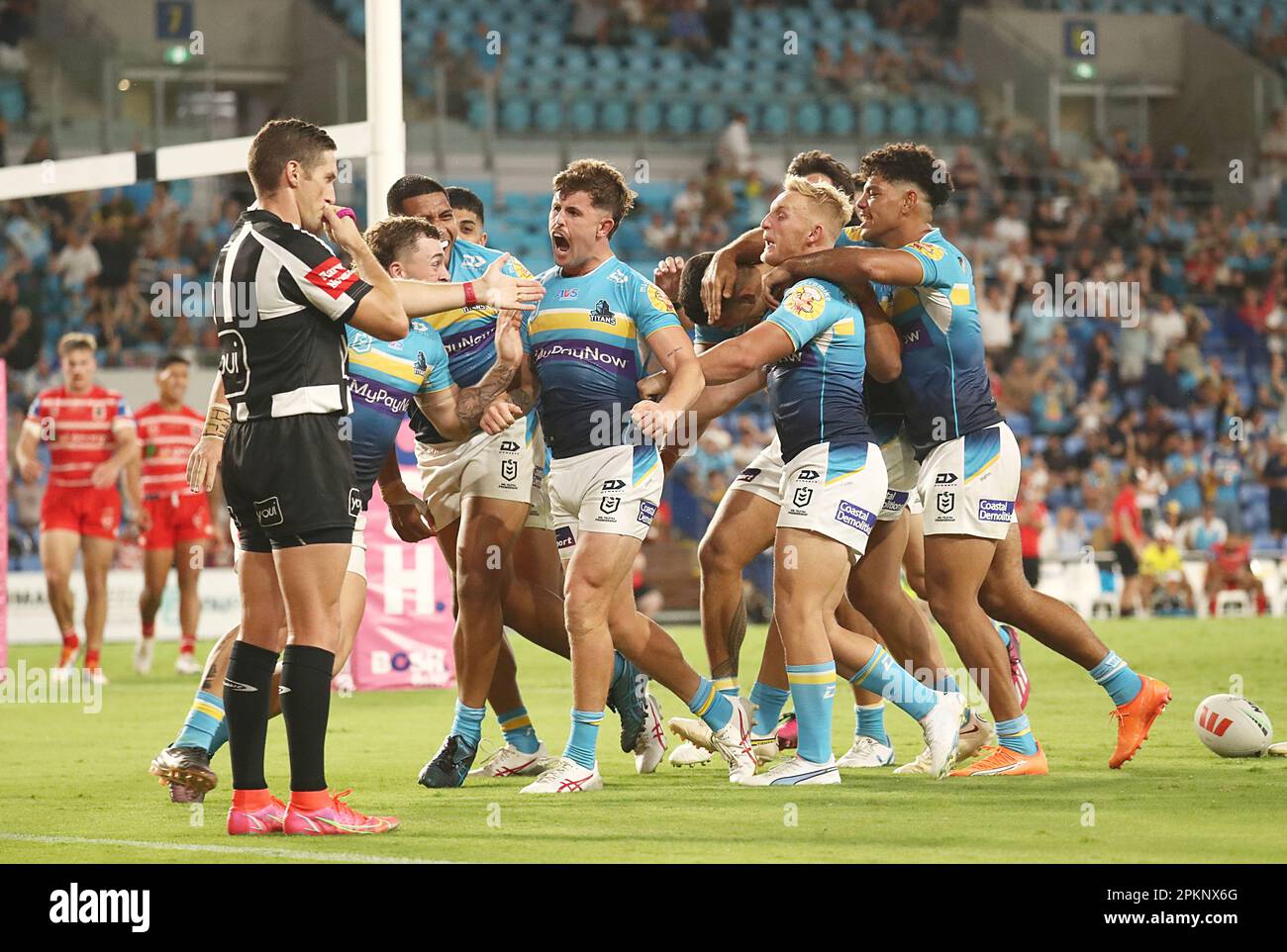 Toby Sexton of the Titans celebrates scoring a try during the NRL Round ...