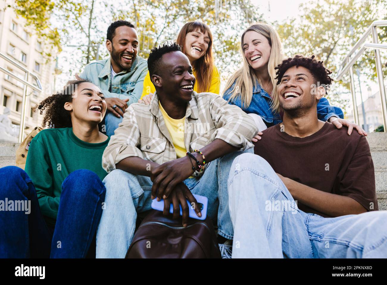 Young group of friends enjoying social moment together Stock Photo - Alamy