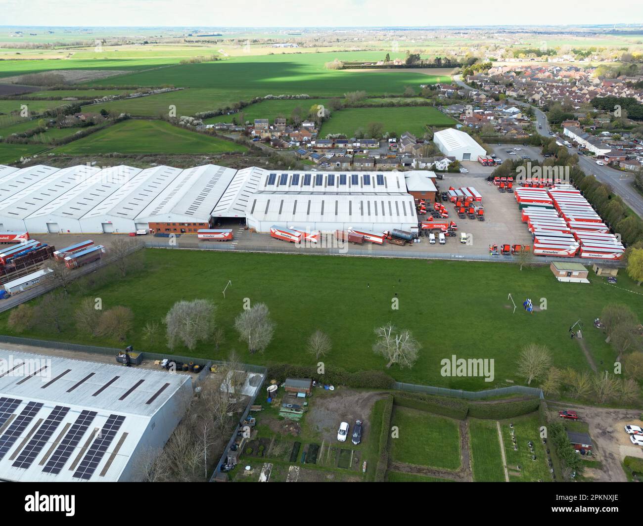 Drone view of a logistics and distribution warehouse. Showing parked ...