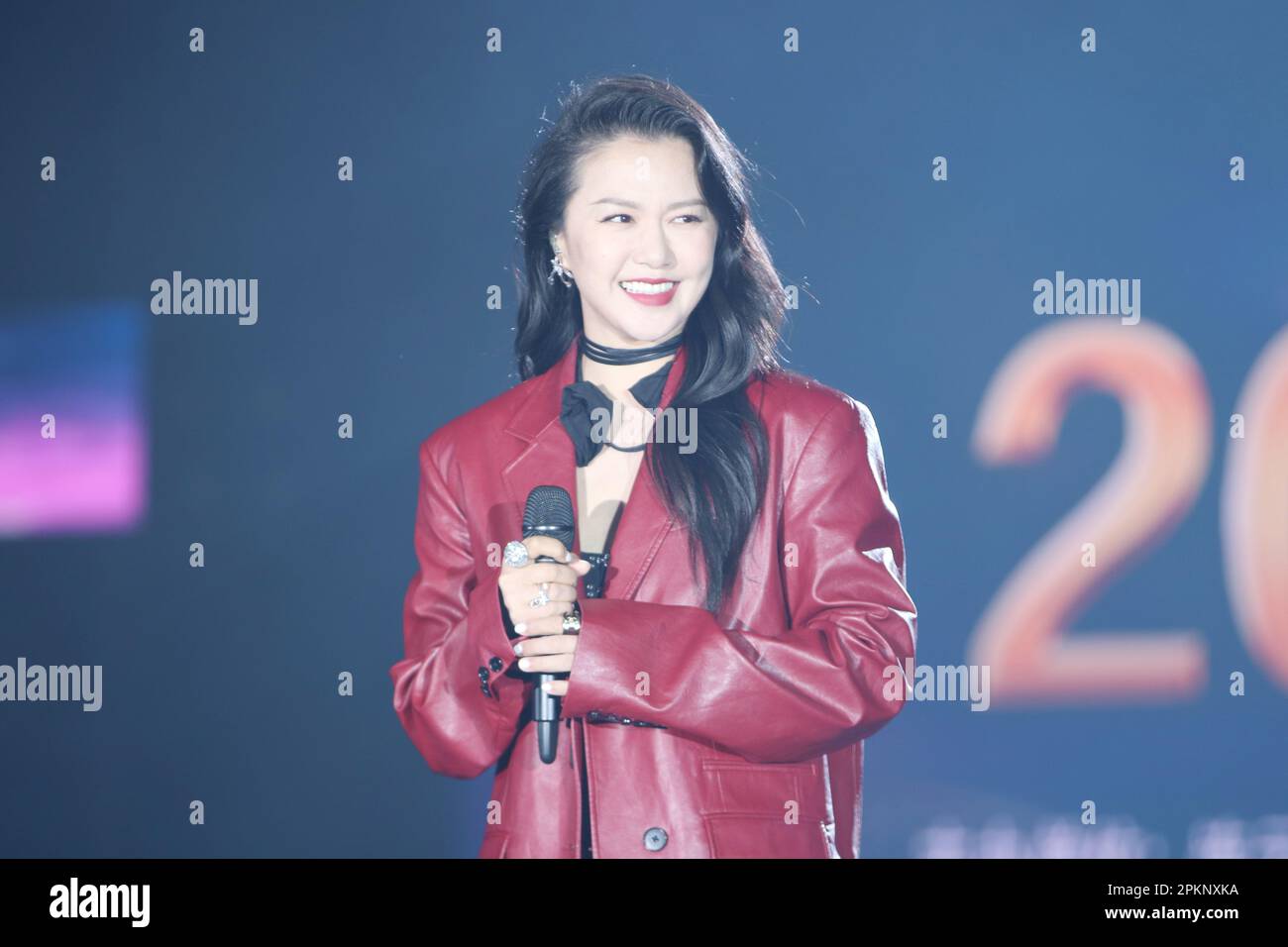 LIANYUNGANG, CHINA - APRIL 8, 2023 - Singer Tan Weiwei (Sitar tan ...