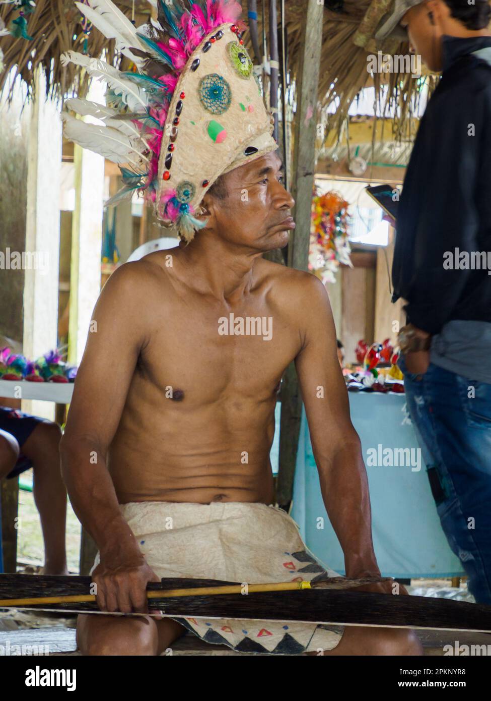 Macedonia, Leticia region, Colombia - Dec, 2021: Man from the Ticuna tribe. Native Amazonian man ...
