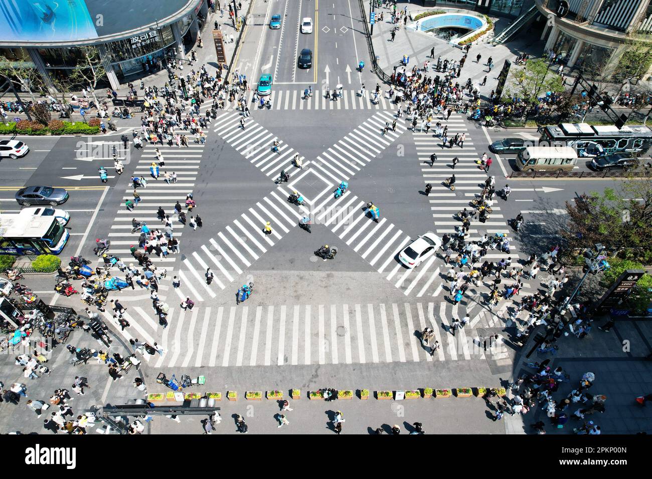 HANGZHOU, CHINA - APRIL 9, 2023 - Citizens walk across an X-shaped ...