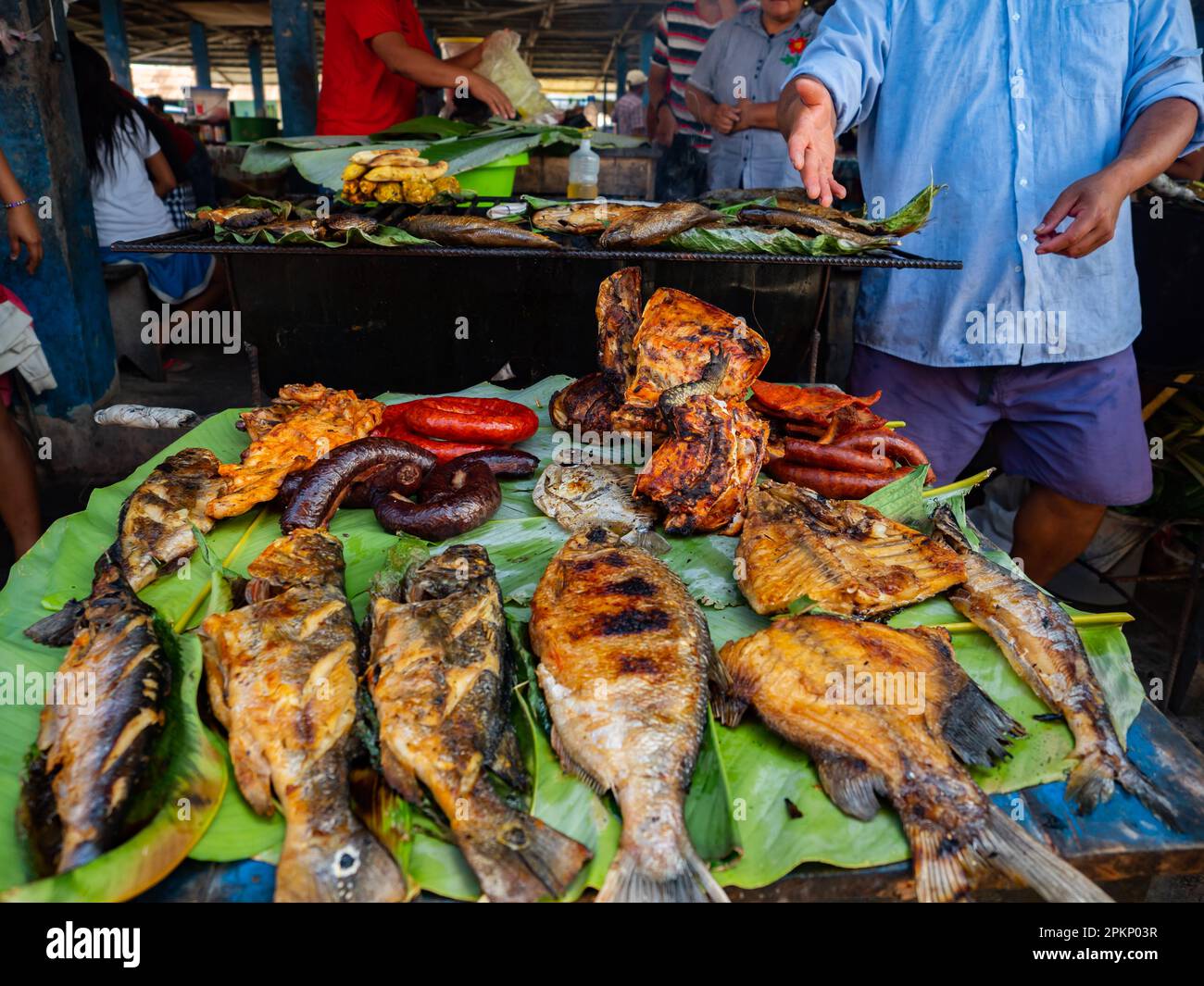 Iquitos, Peru - March 2018: Baked fish and other local delicacies in ...