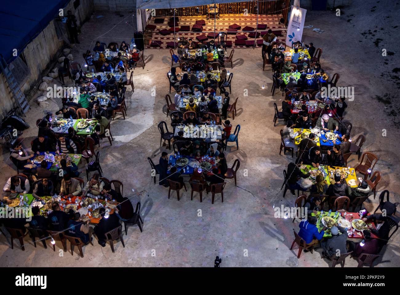 08 April 2023, Syria, Idlib: A view of a mass iftar for orphaned ...