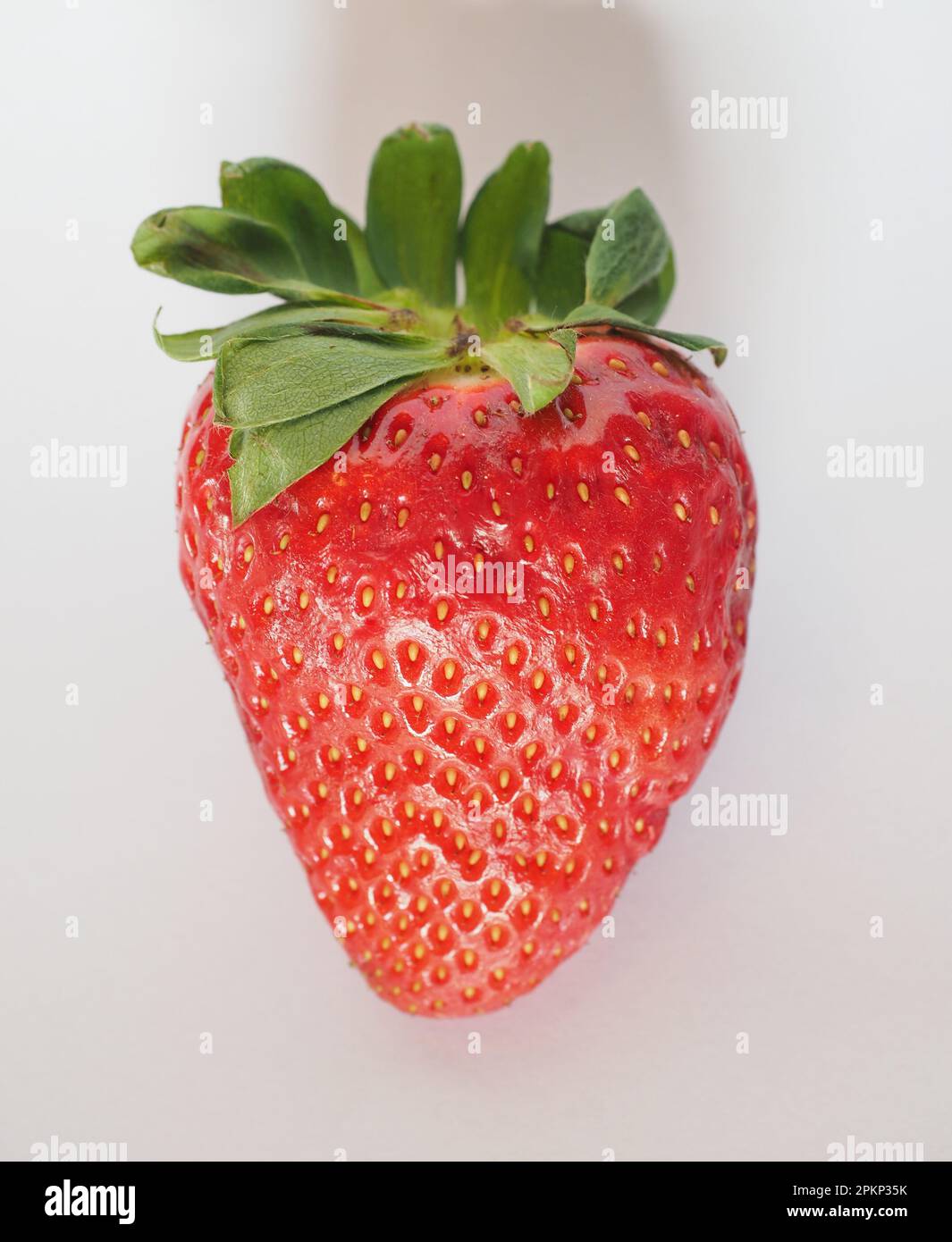 red strawberry fruit over off white background Stock Photo - Alamy