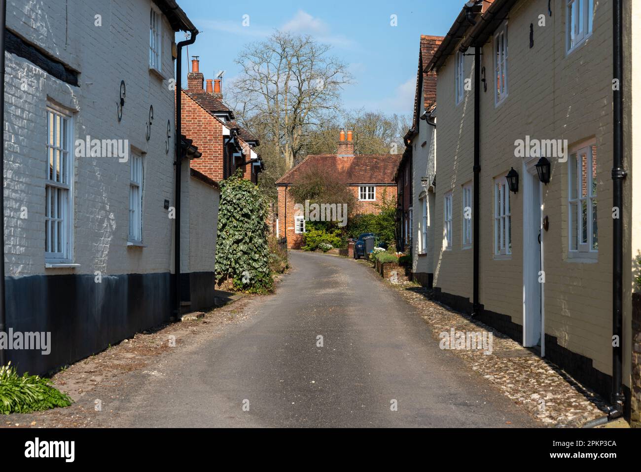A quiet narrow lane in the Hampshire village of Hambledon, England ...
