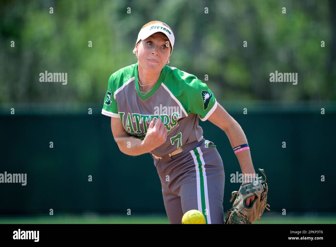 Stetson's Lauren Klein (7) throws during an NCAA college softball game ...