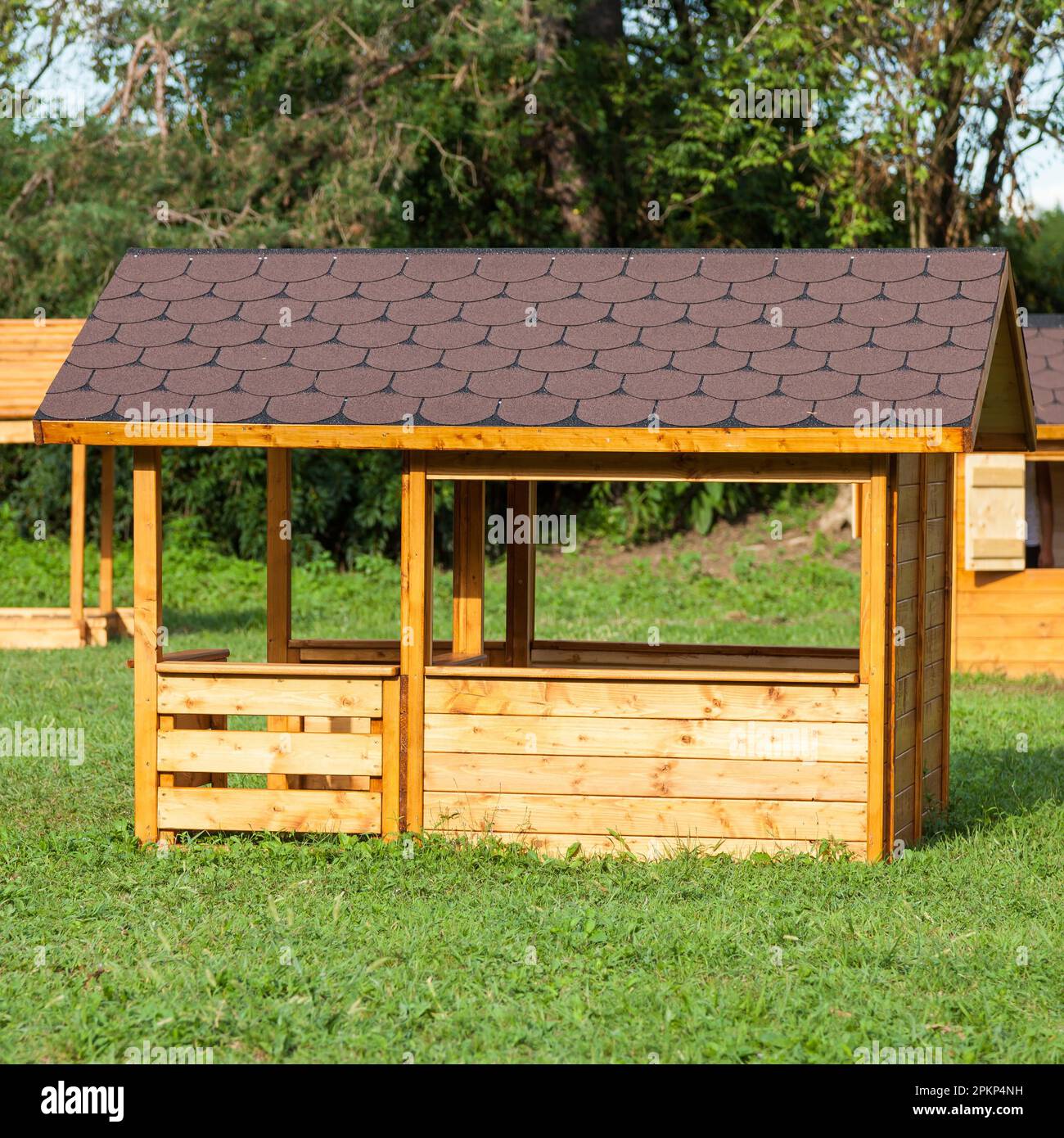 Small children houses made of wood in an Italian park Stock Photo - Alamy