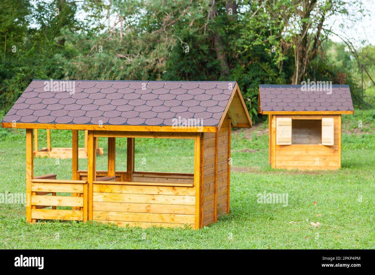 Small children houses made of wood in an Italian park Stock Photo - Alamy