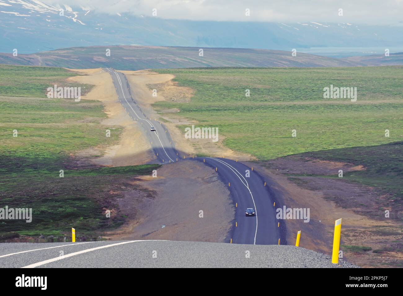 Very undulating road runs through barren landscapes, little traffic ...