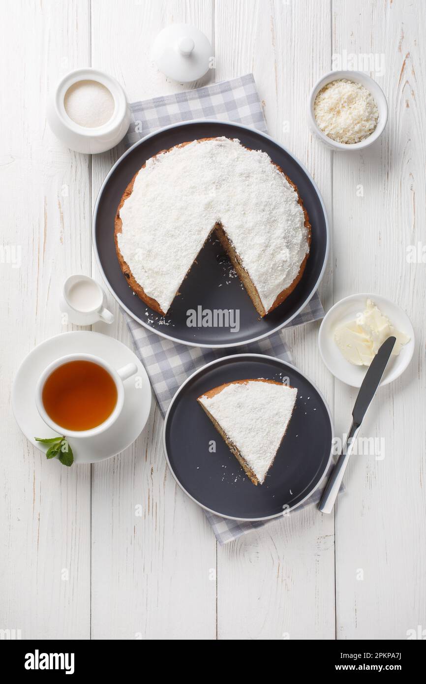 Boston bun is a big, spiced bun with thick layer of coconut icing on ...