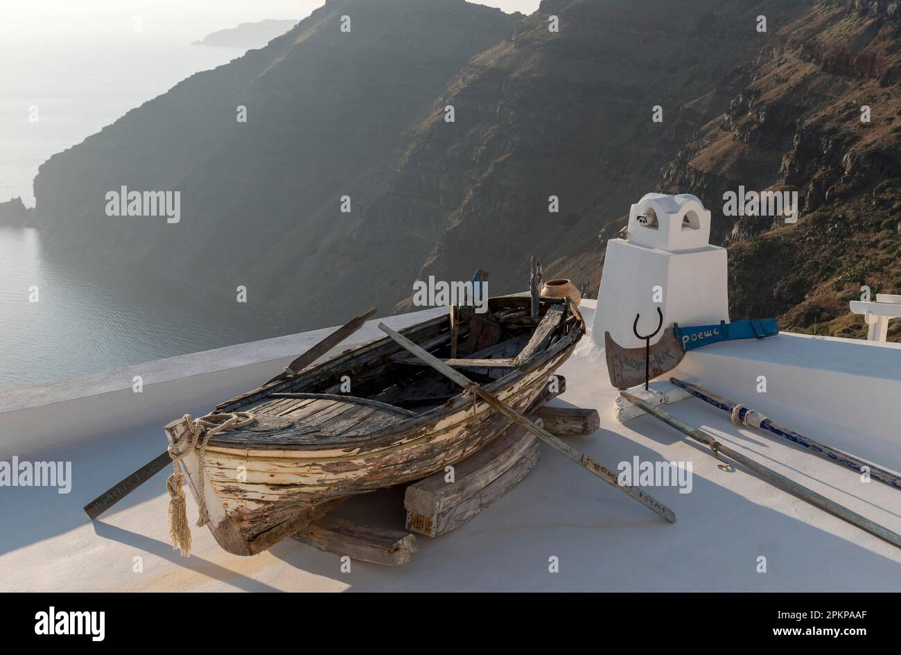 Old rowing boat on terrace roof, Firostefani, Santorini, Greece, Europe ...