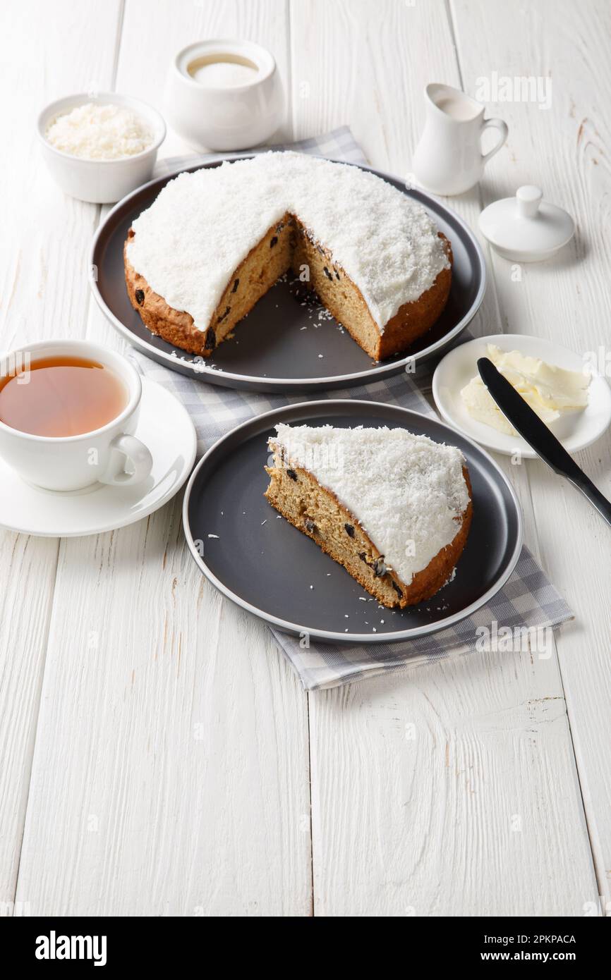 Boston bun is a big, spiced bun with thick layer of coconut icing on ...