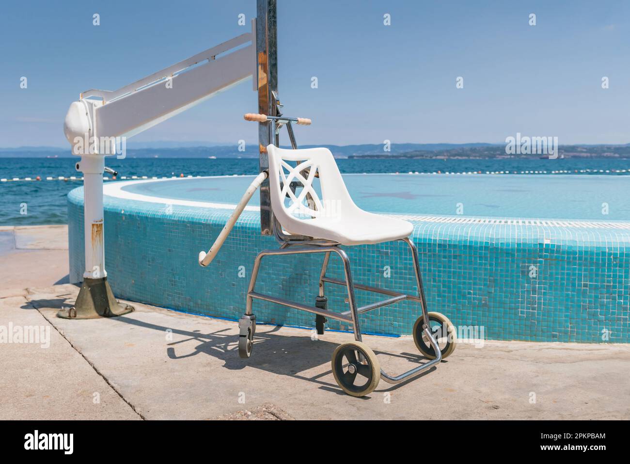 Accessible beach with wheelchair with lift for persons with disability ...