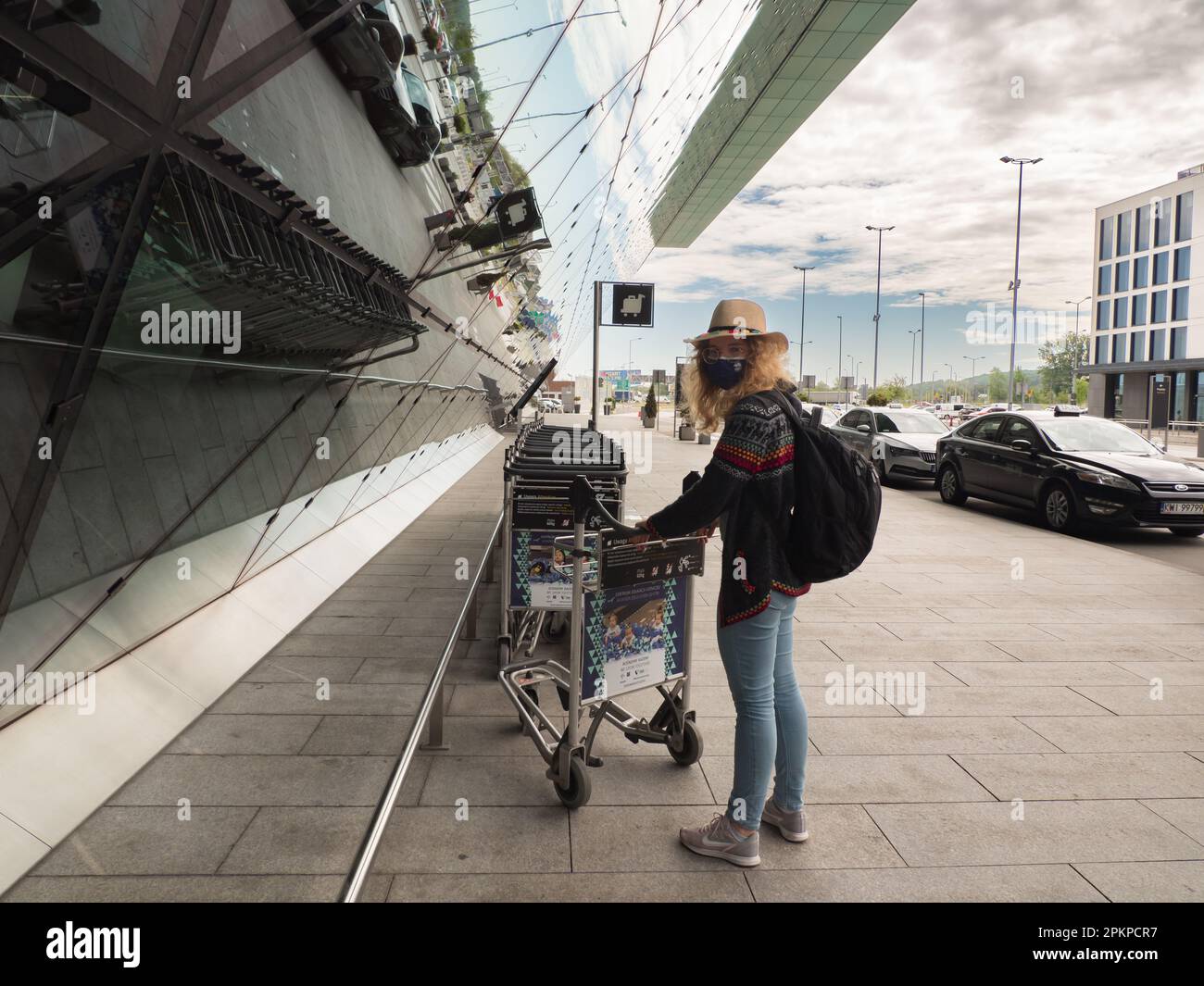 Kraków, Poland - May, 2021: Young woman with the mask on teh face ...