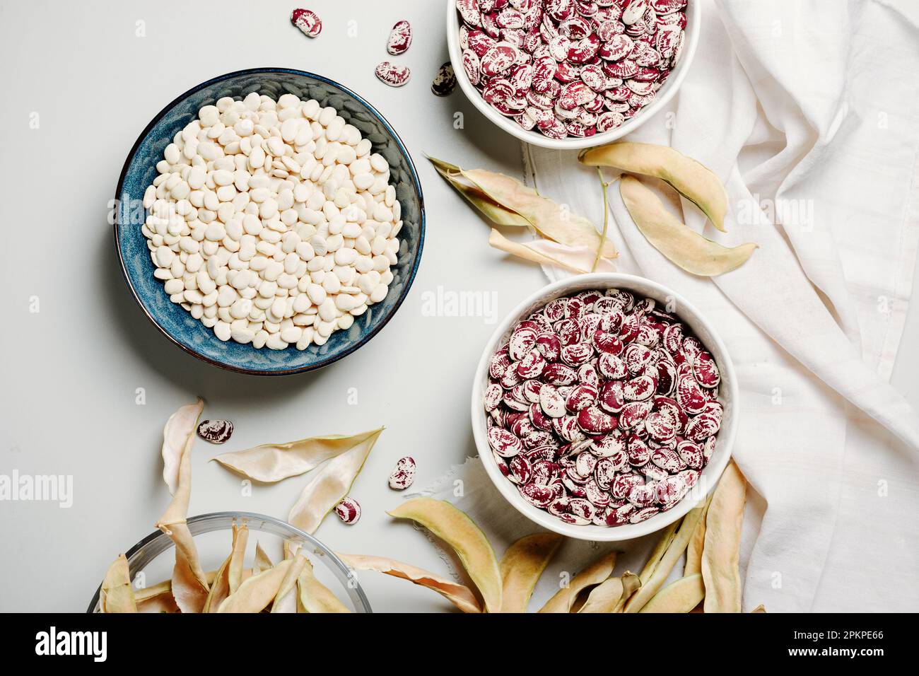 Peeled beans in bowls on the table, top view Stock Photo - Alamy