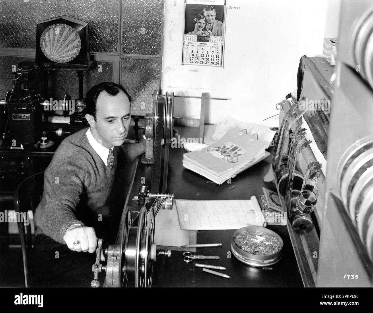 Film Editor BEN LEWIS at work editing DINNER AT EIGHT 1933 director ...