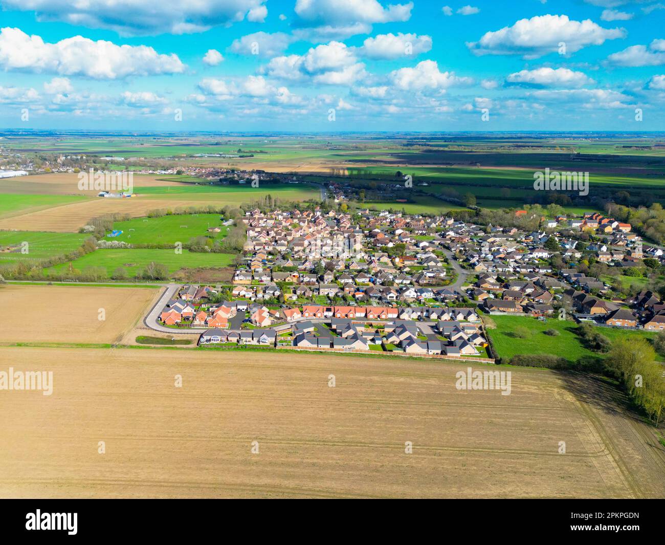 Drone view of a new housing estate showing detached bungalows in a ...