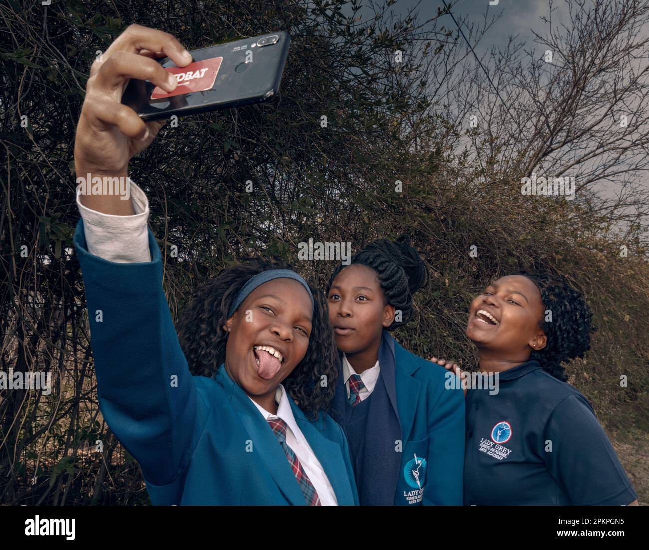 Lukhanyo, Emihle and Samkele do a selfie in front of their school in ...