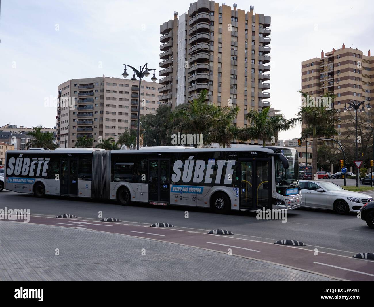 Hybrid Man articulated bus in Málaga, Spain Stock Photo - Alamy