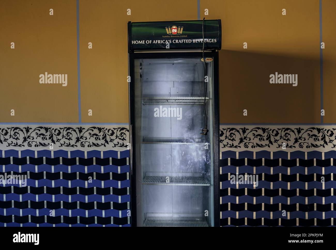 The empty beer fridge at the Kolmanskop Museum and restaurant Stock ...