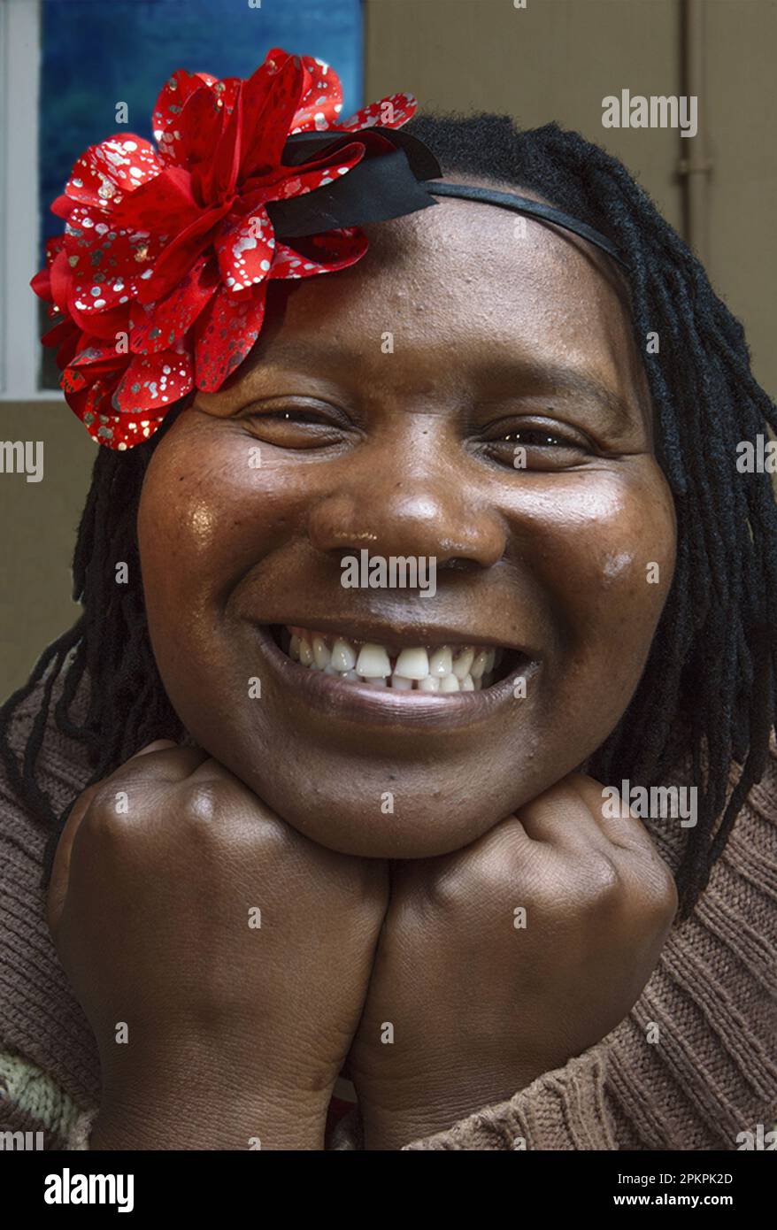 Meriot Badanile Ngubo smiles at the camera on Twin Springs Farm near ...